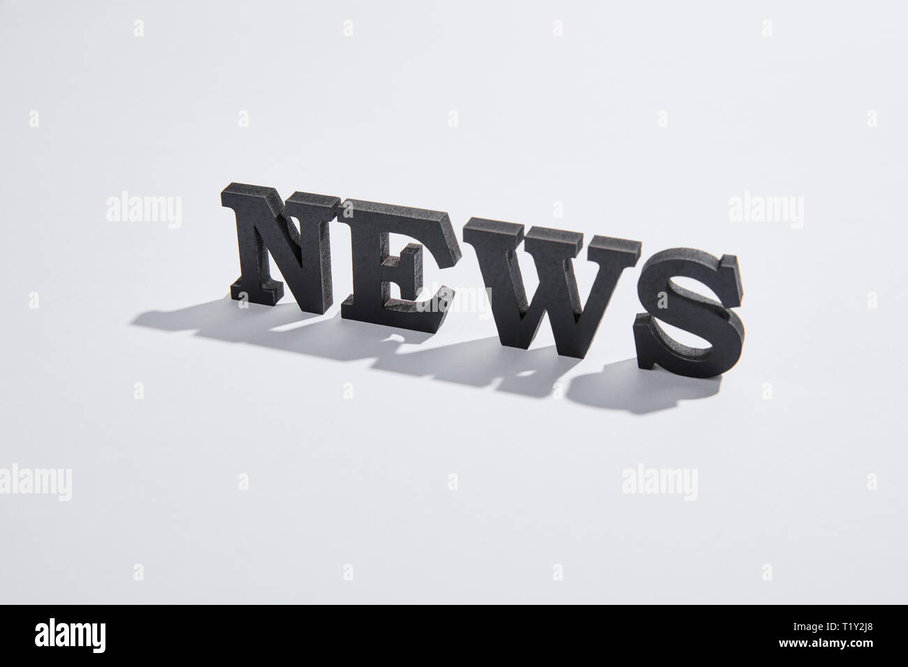 news lettering with shadows and copy space on white Stock Photo - Alamy