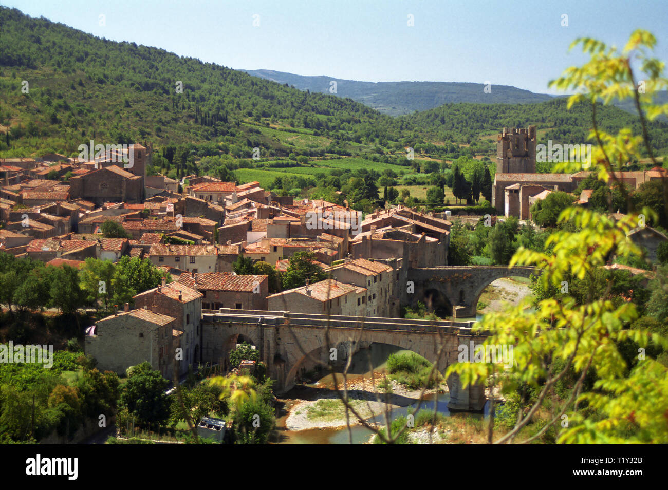 The beautiful village of Lagrasse, with the C12th footbridge over the ...