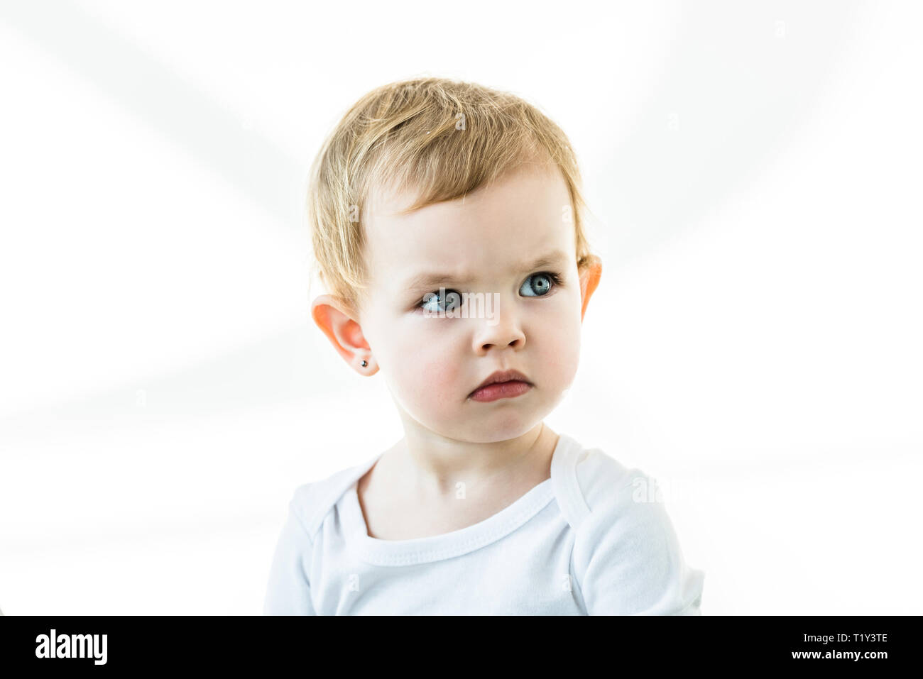 thoughtful baby with blonde hair looking away isolated on white Stock ...