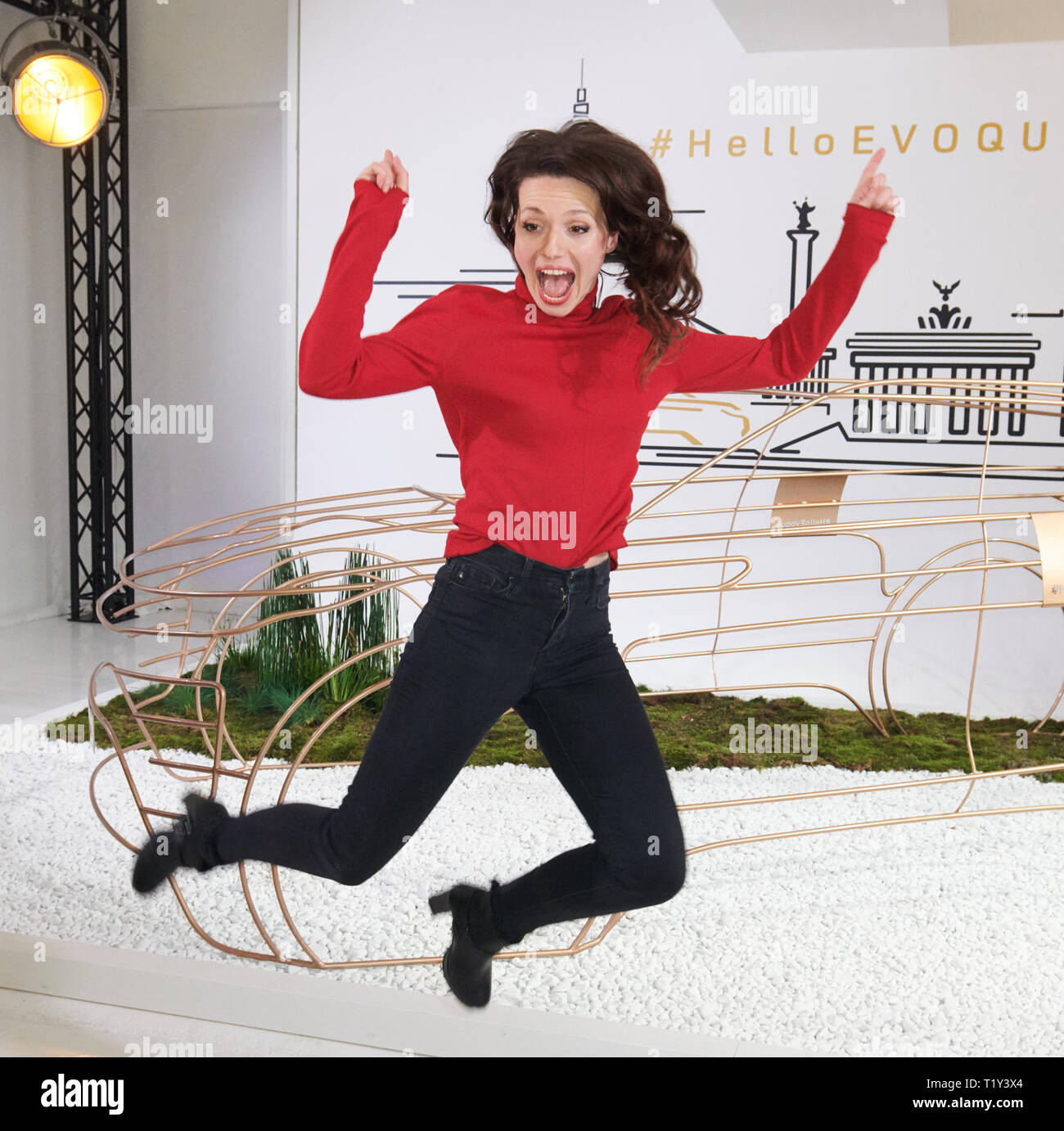 Berlin, Germany. 28th Mar, 2019. The actress Julia Hartmann jumps up on ...