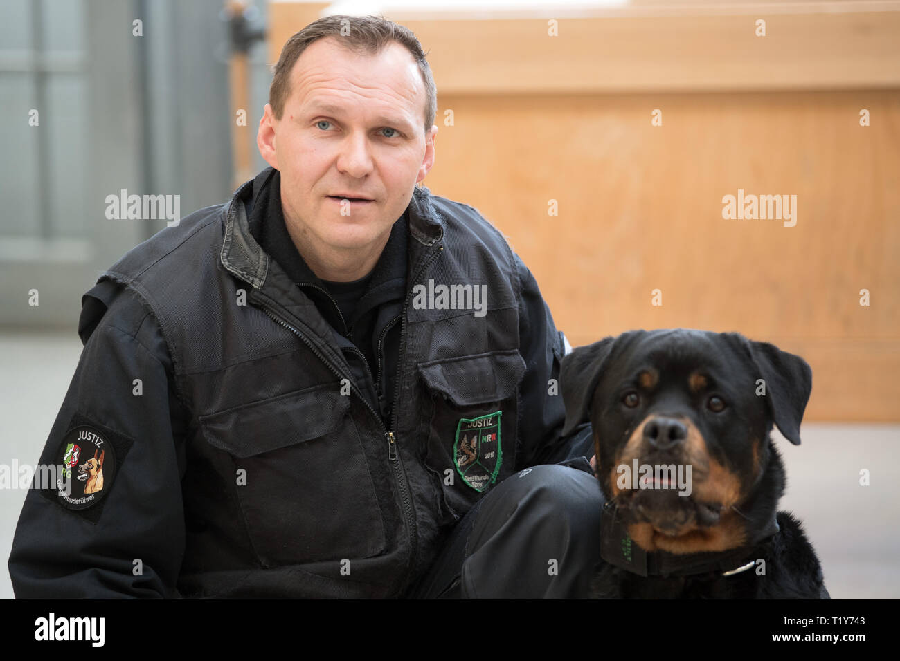 21 March 2019, North Rhine-Westphalia, Köln: Service dog handler Darius ...