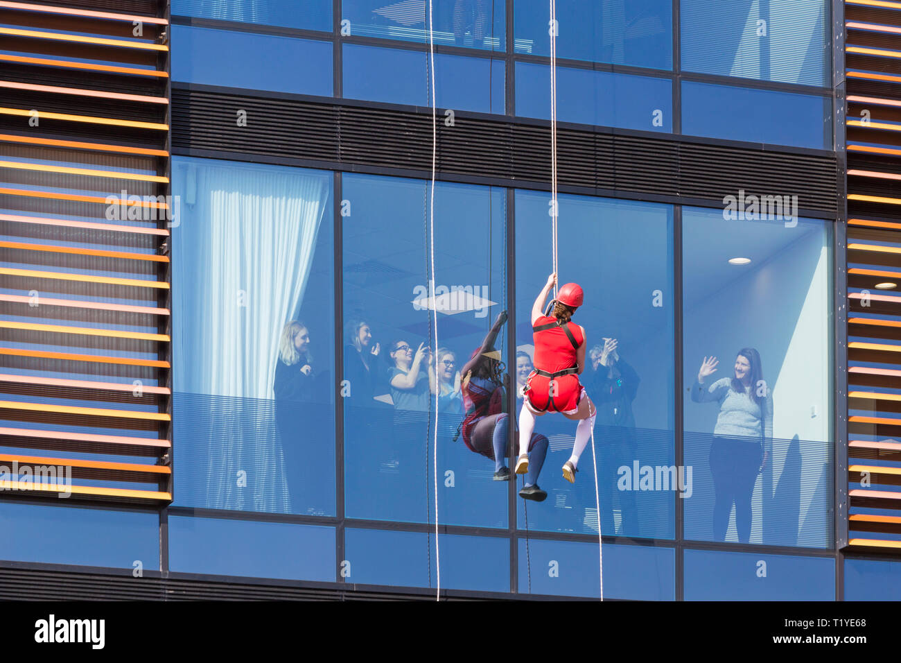 Waving clapping applauding supporting cheering hi-res stock photography ...