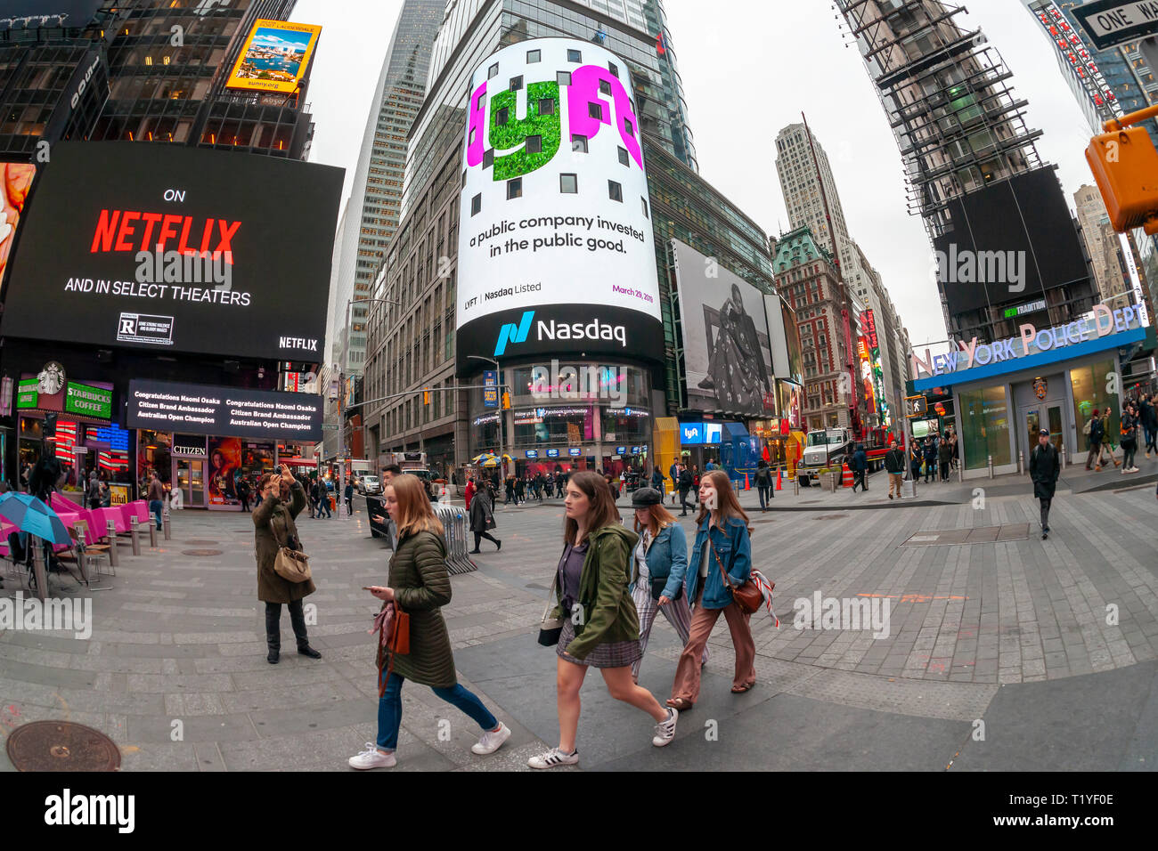 New York, USA. 29th Mar 2019. The giant video screen on the Nasdaq ...