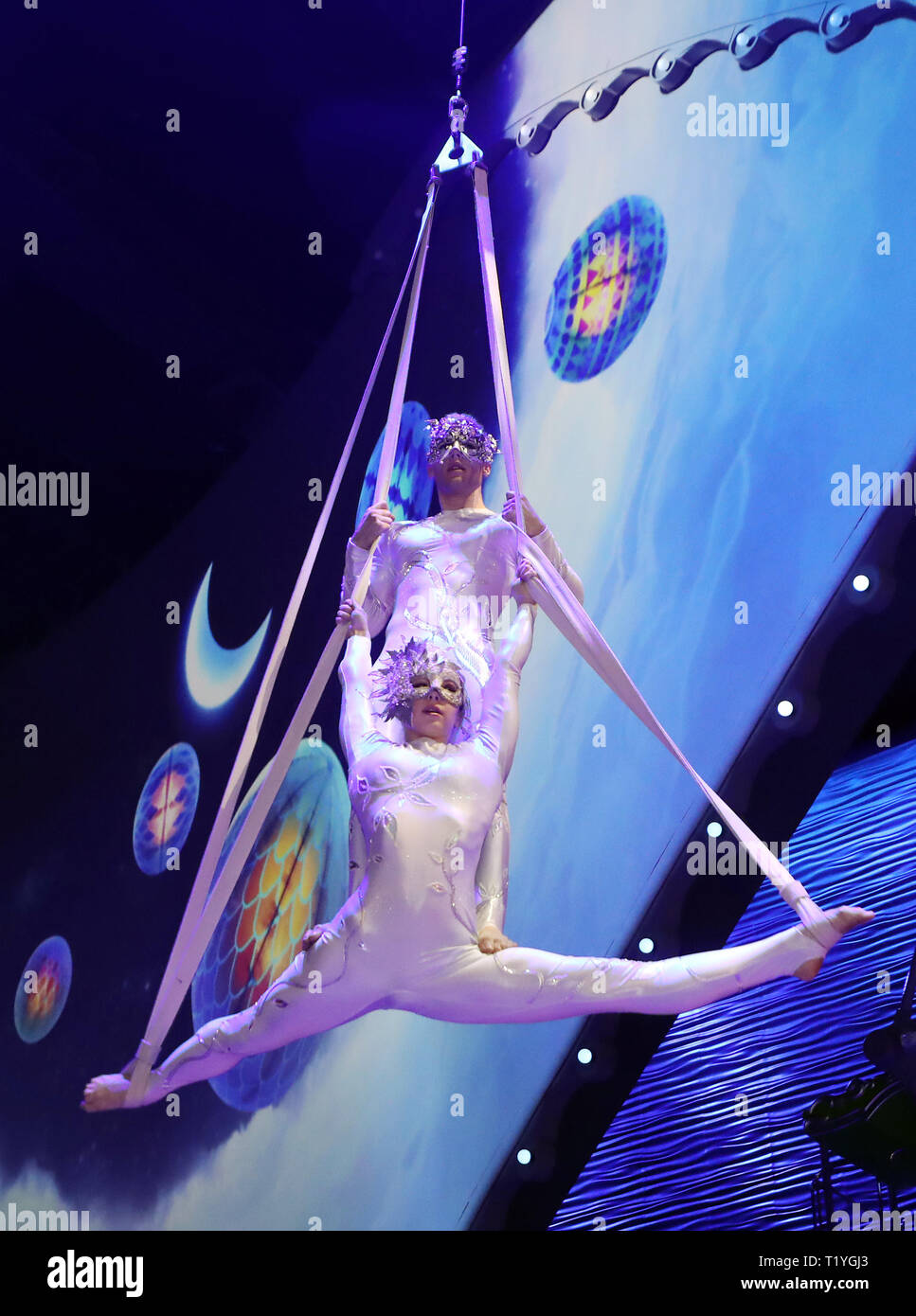 Performance at theme park A troupe puts on an aerial show during a ...