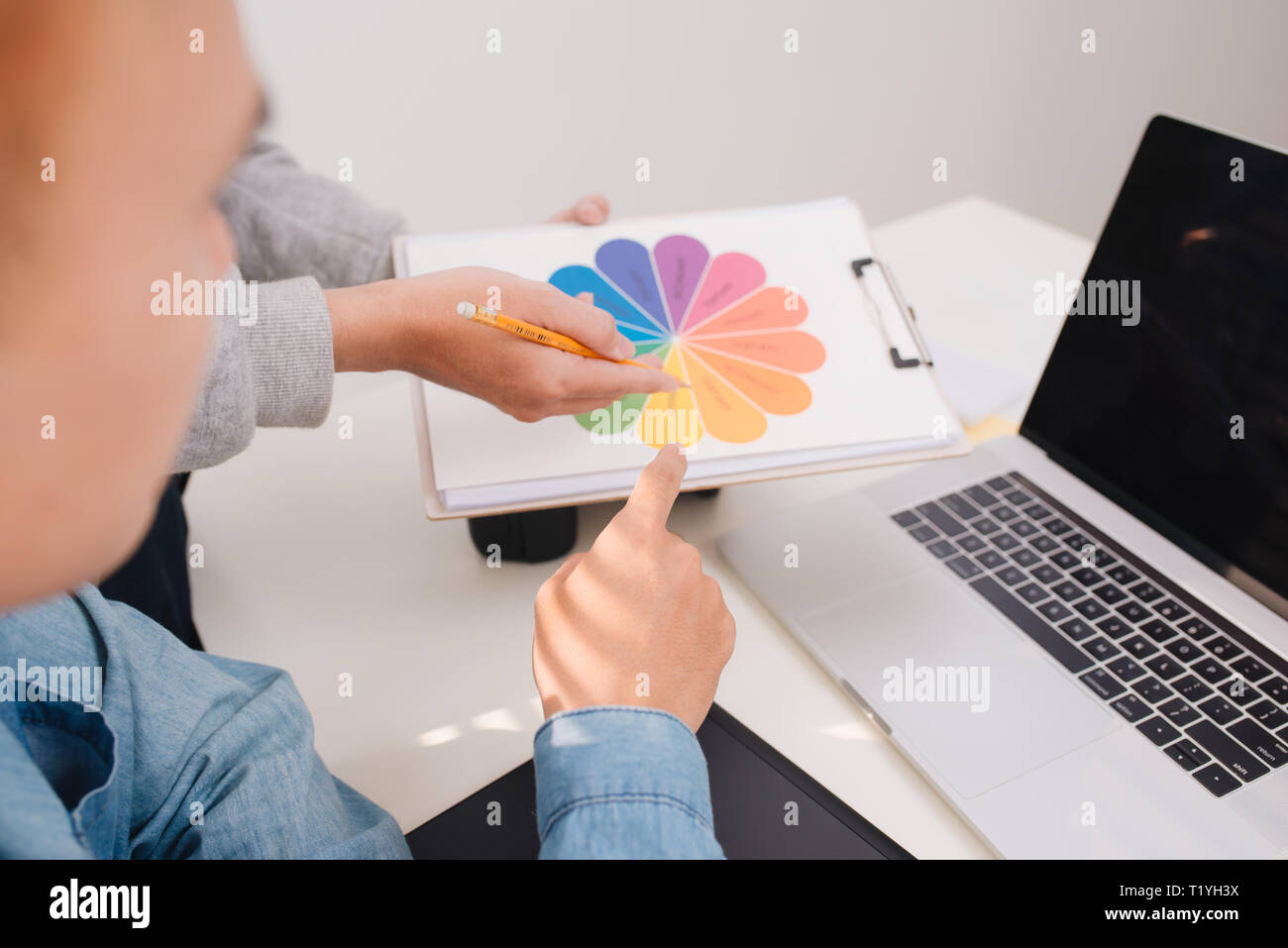 Coworking process, designers team working on computer in modern office ...