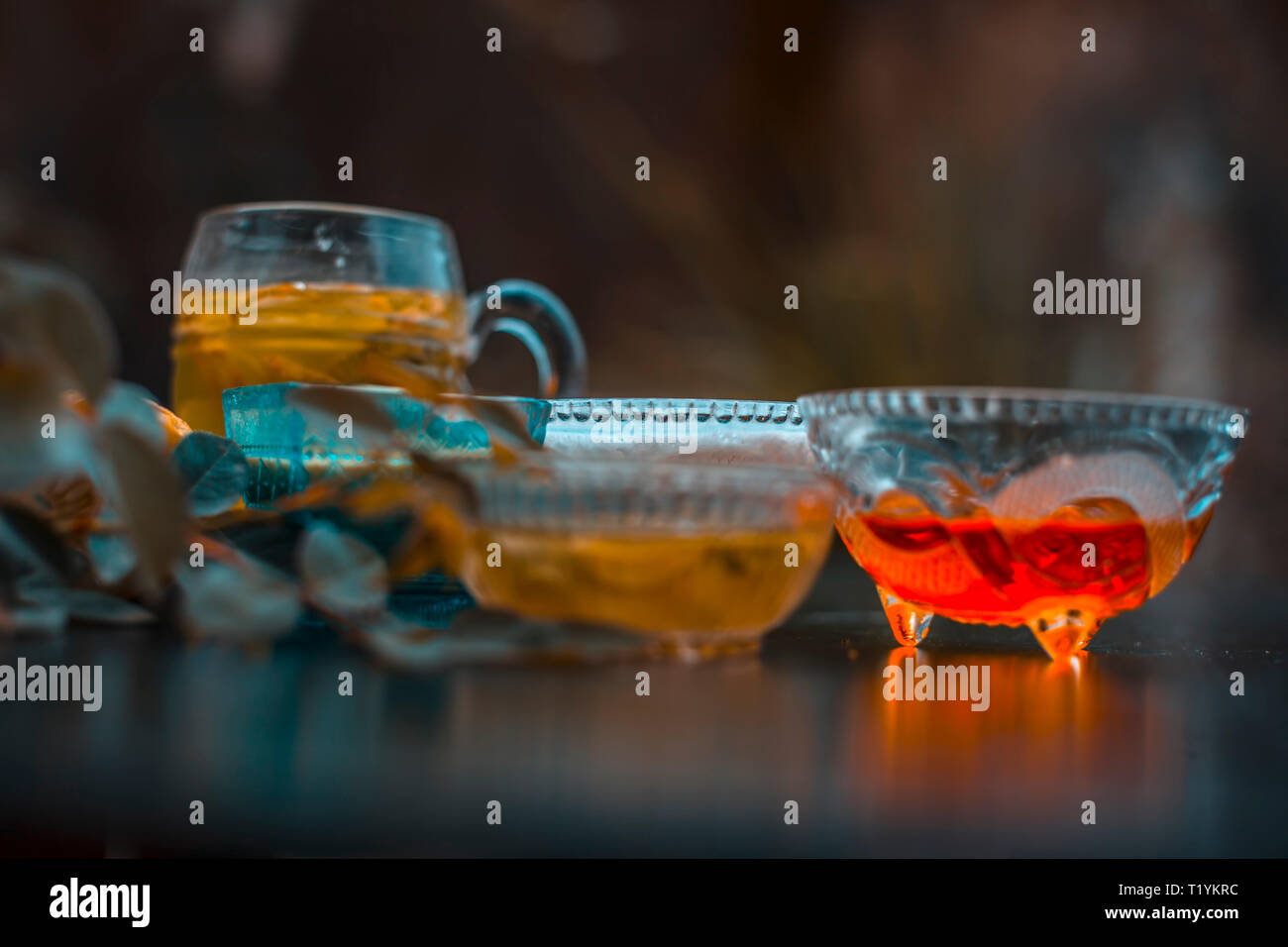 Floral face pack of curd,cucumber, aloe vera gel and honey on wooden ...