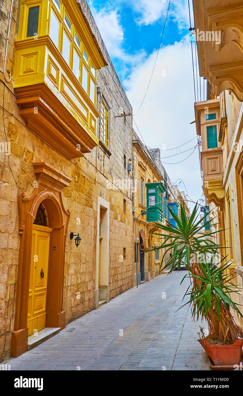 Traditional Maltese architecture includes the carved wooden doors and ...