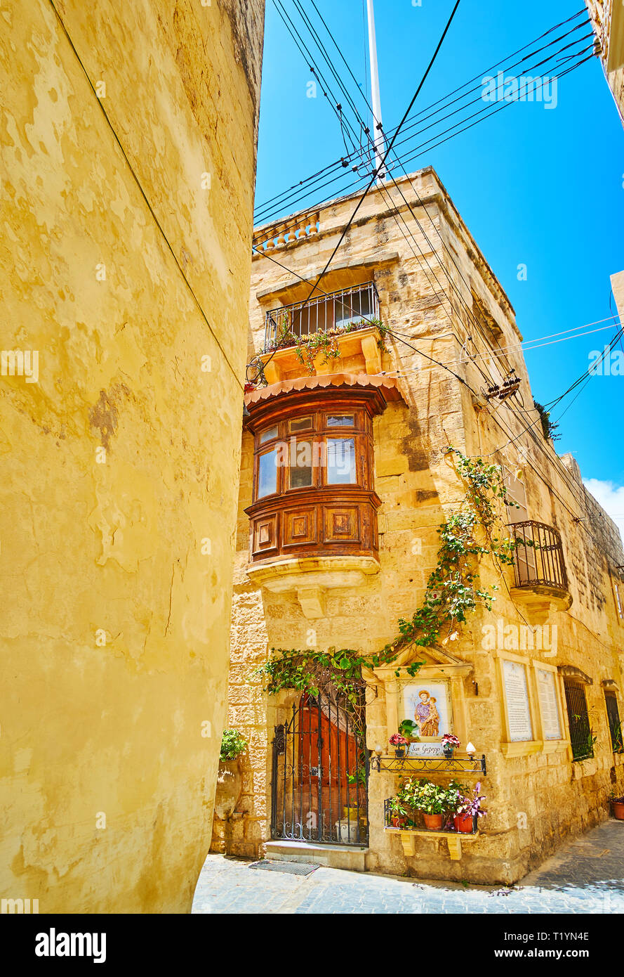 The medieval mansion decorated with tile icon of St Joseph (San Guzepp ...