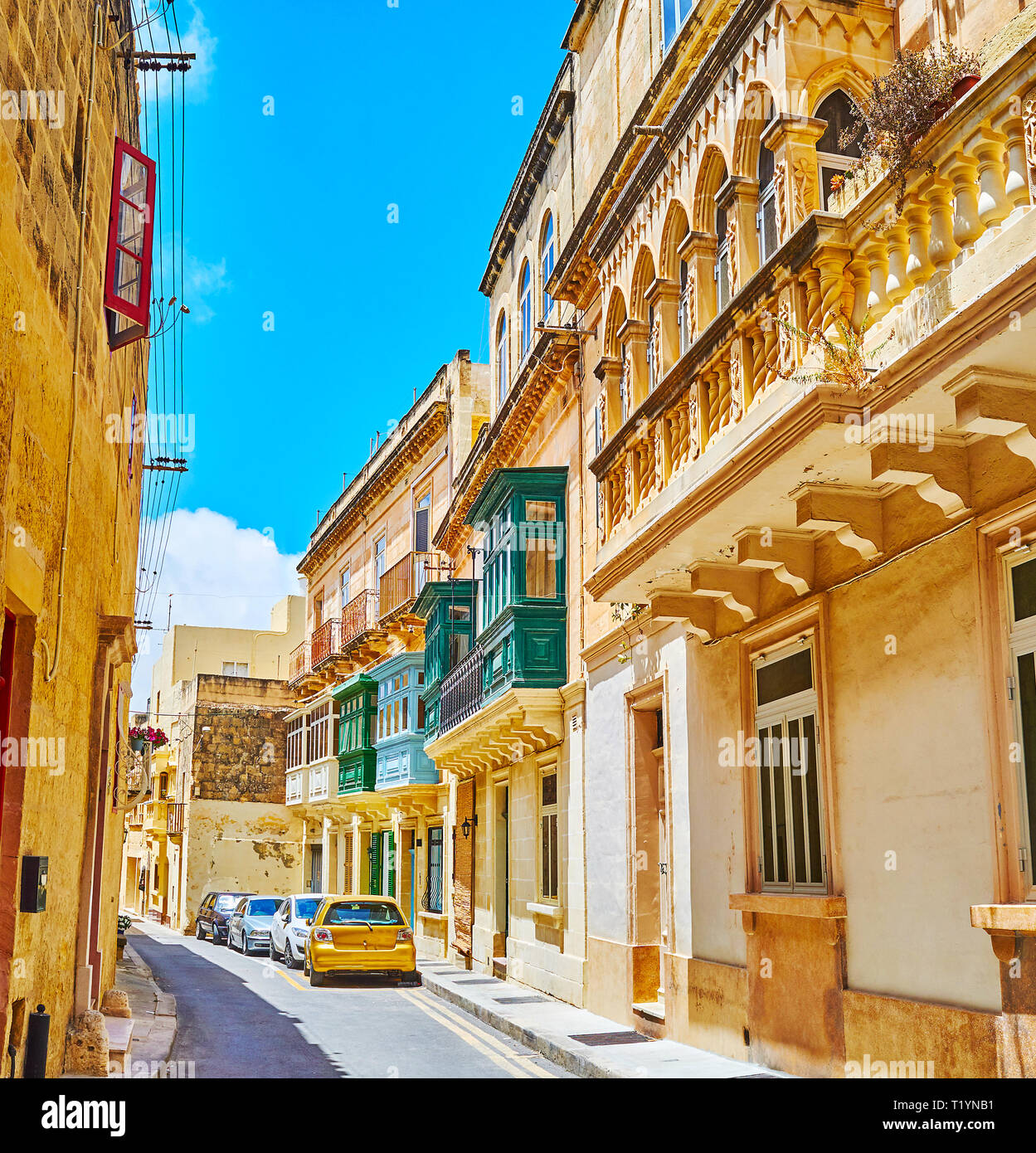 Walk the medieval city street, lined with historical edifices ...