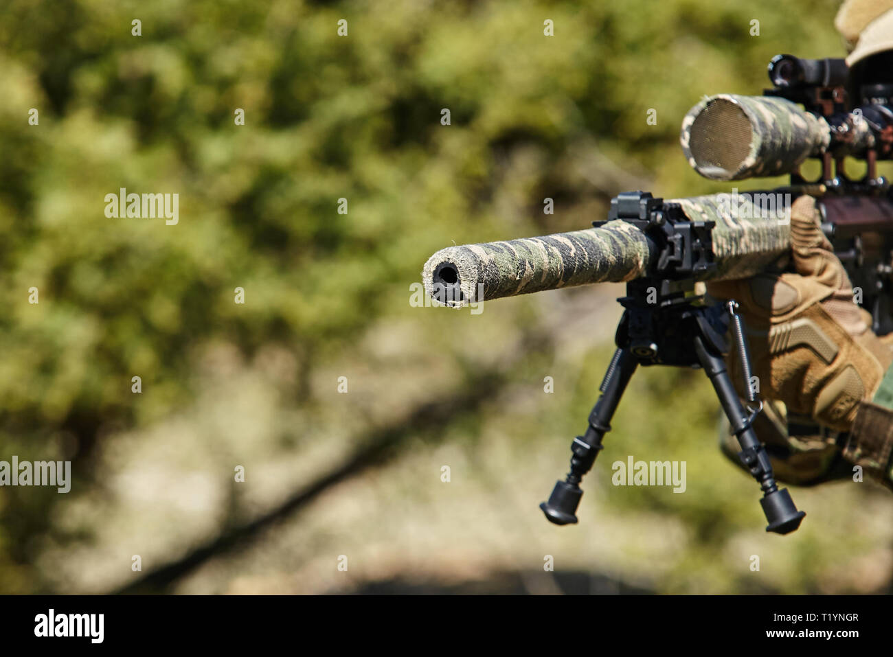 Sniper soldier ready to shoot at the target.Military concept Stock ...