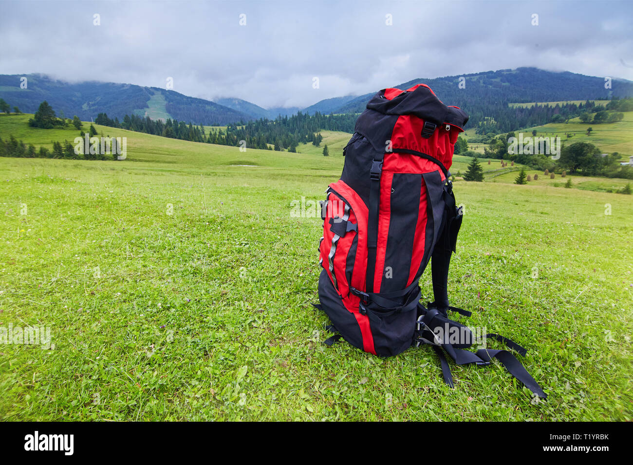 Travel backpack on the mountain landscape view background. Traveler ...
