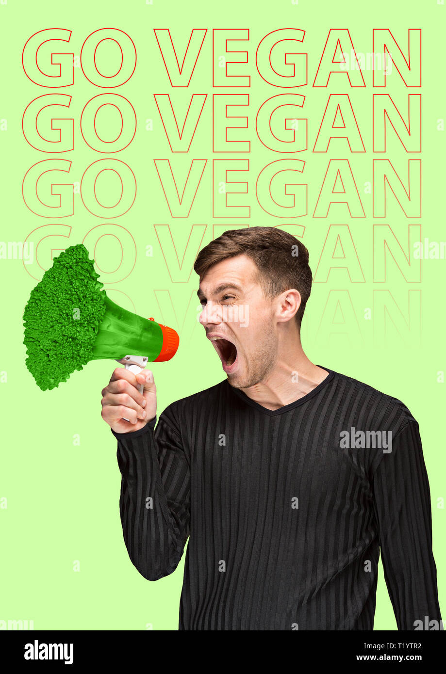 Veganism shouts out louder than plastic world. Young man screaming into ...