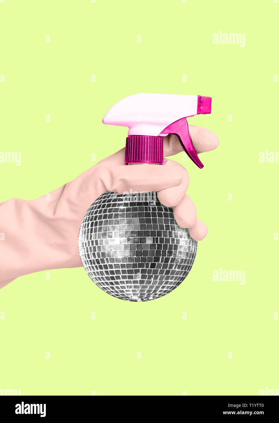 An alternative cleaning - disco spraing bottle. Hand in a housewifely ...