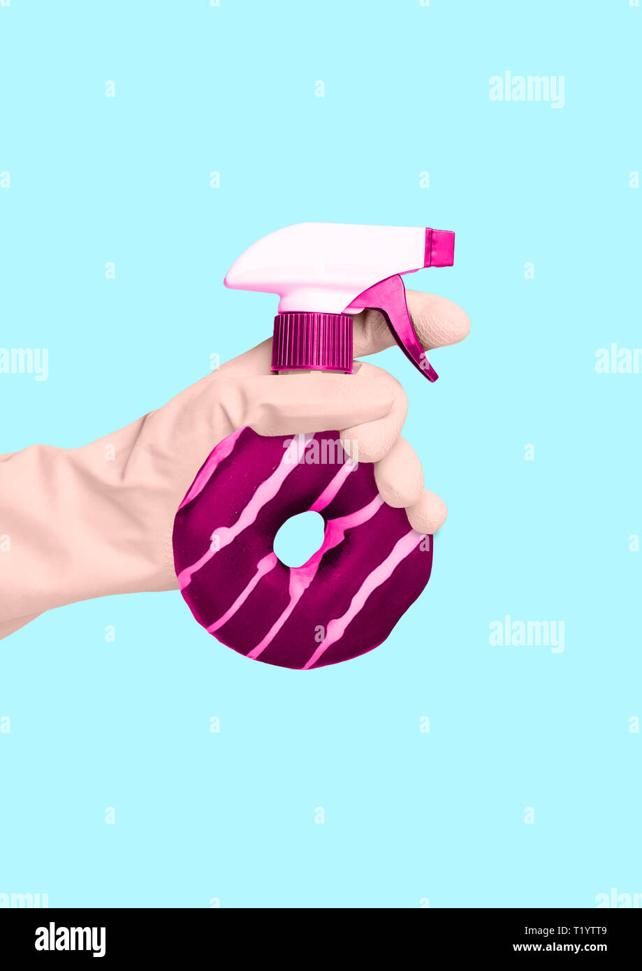 An alternative cleaning - sweet spraing bottle. Hand in a housewifely ...