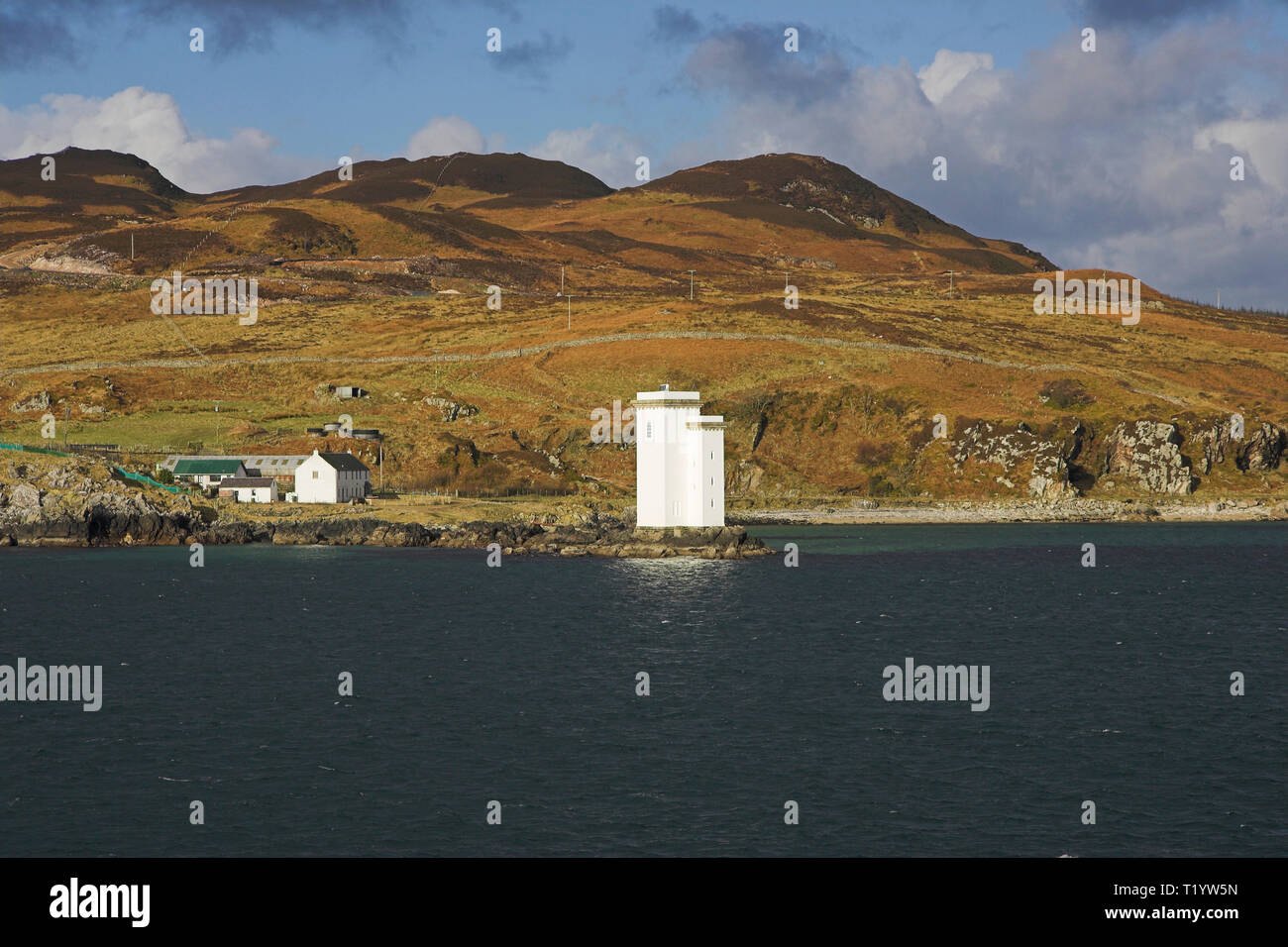 Lighthouse at the western side of the entrance to Port Ellen harbour ...