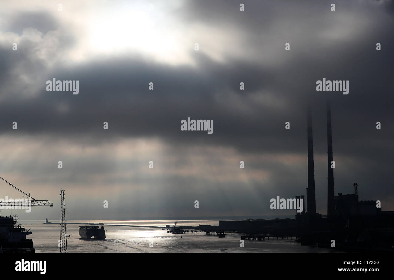 A vessel leaves Dublin Port as the good weather continues Stock Photo ...