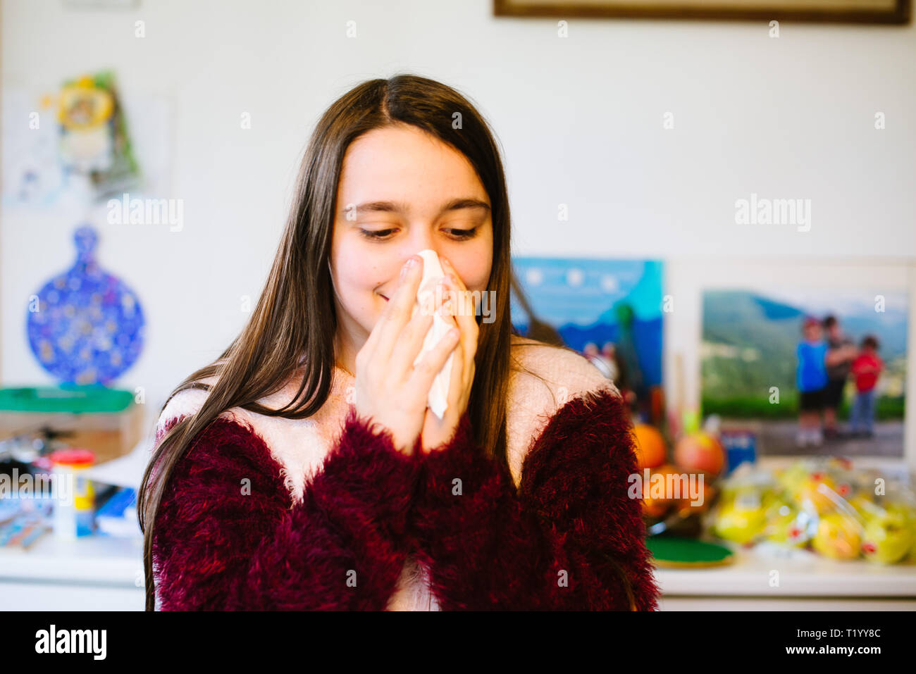 12-year-old girl blows her cool nose - portrait of a girl with a cold ...