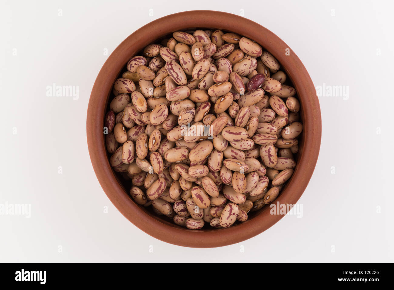 A plate of beans on white background Stock Photo - Alamy