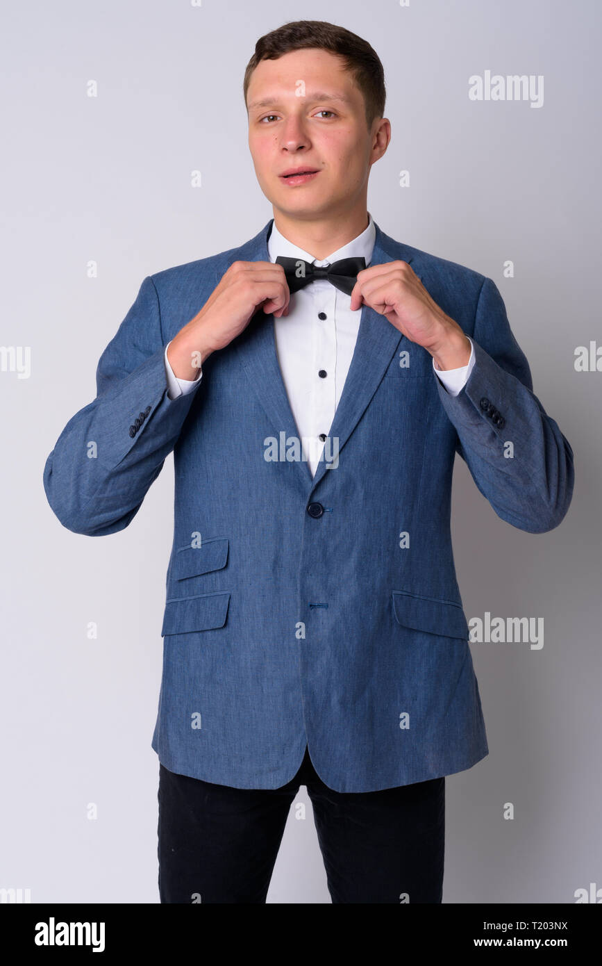 Fixing bow tie hi-res stock photography and images - Alamy