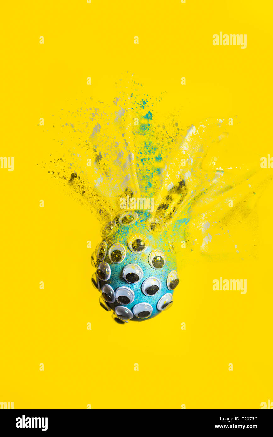 Creative minimal concept. Conspiracy Theory. Blue egg shell is covered ...