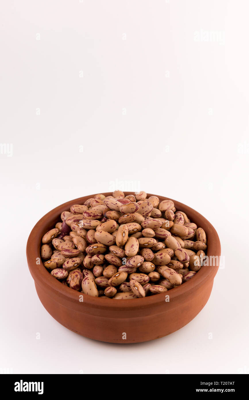 A plate of beans on white background Stock Photo - Alamy