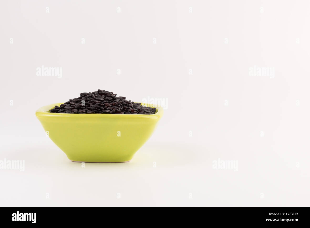 bowl of black wild rice isolated on white background Stock Photo - Alamy