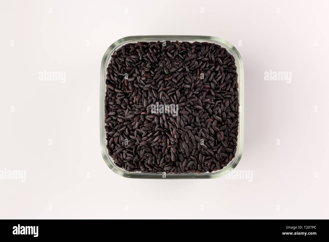 bowl of black wild rice isolated on white background Stock Photo - Alamy