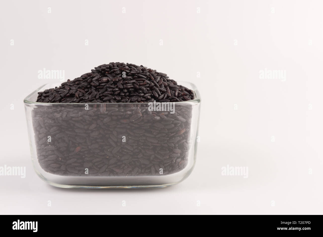 bowl of black wild rice isolated on white background Stock Photo - Alamy
