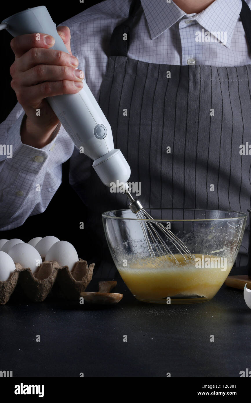 chef make cake. pie making. recipe concept on dark background Stock ...