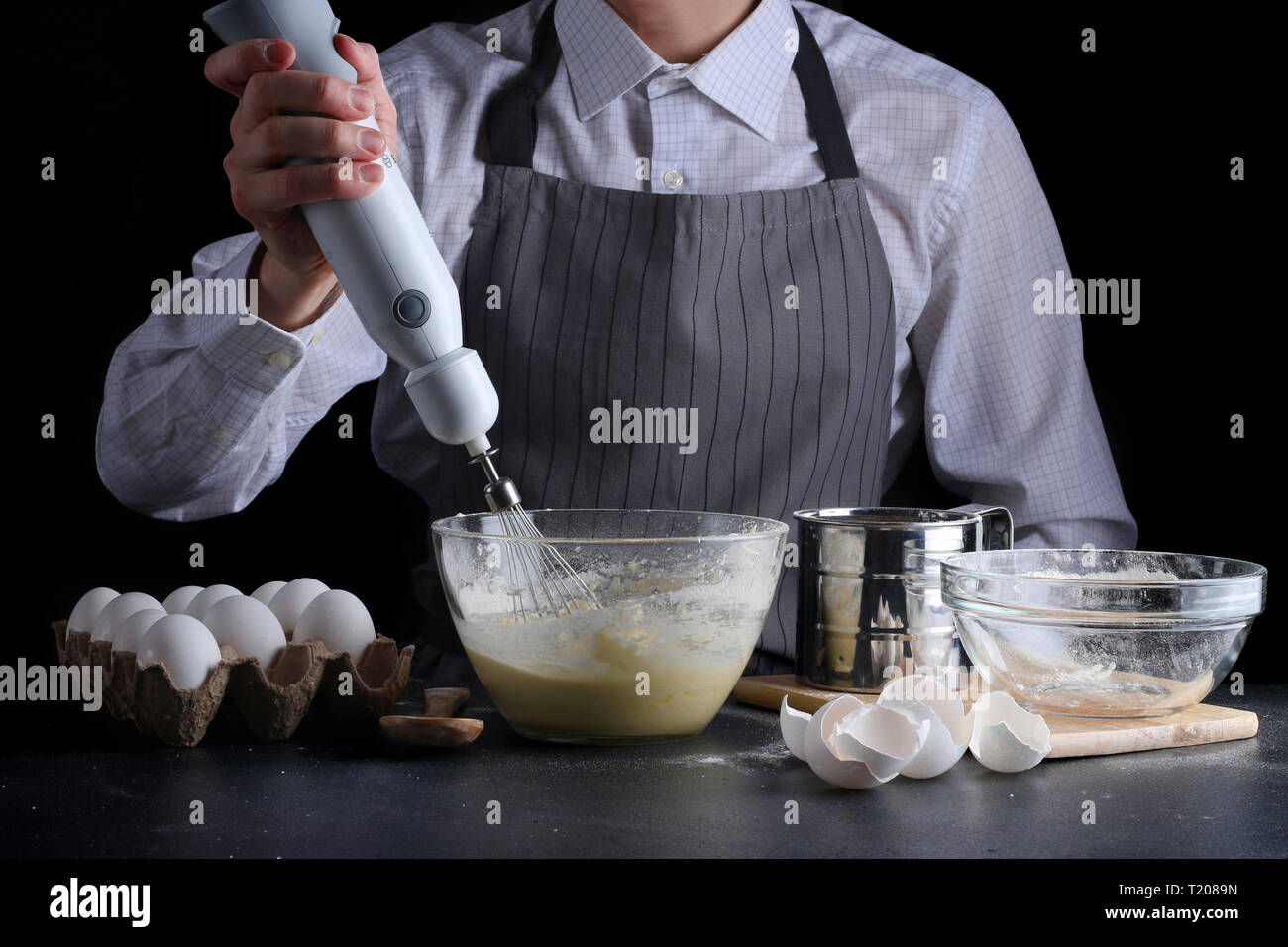 Man hands pouring flour in hi-res stock photography and images - Alamy
