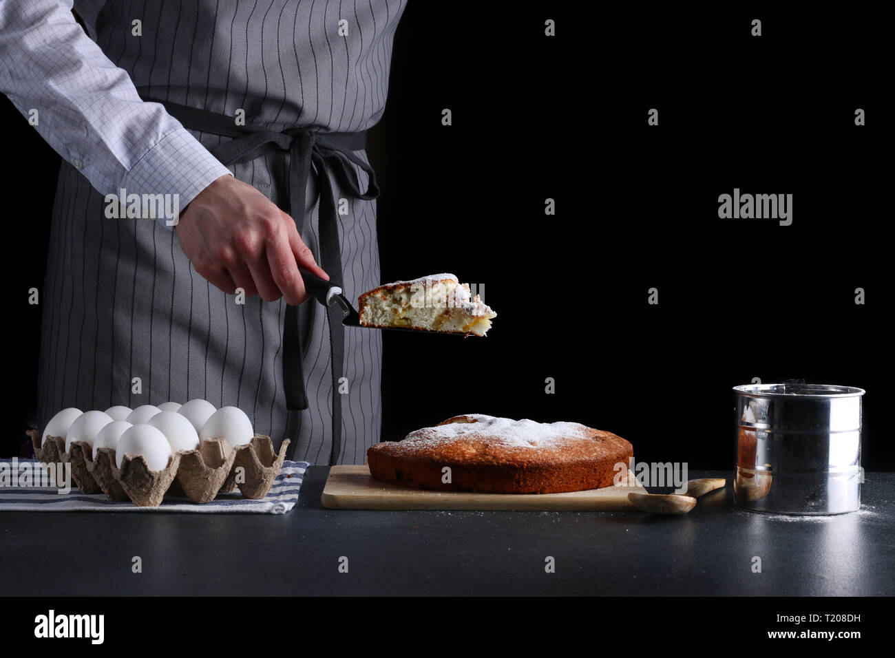 chef make cake. pie making. recipe concept on dark background Stock ...