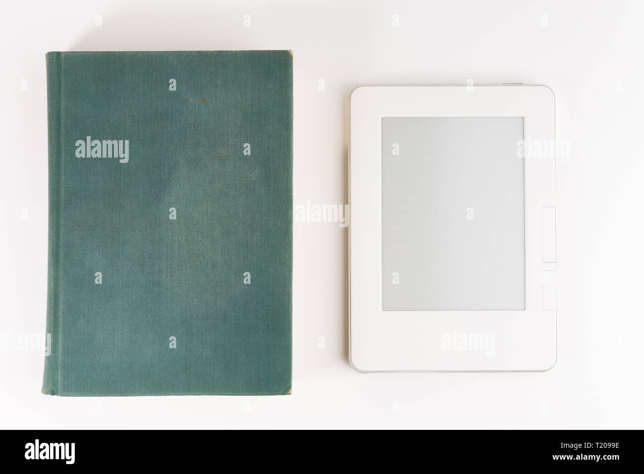 Digital e-book reader with a blank screen with old paper book isolated ...