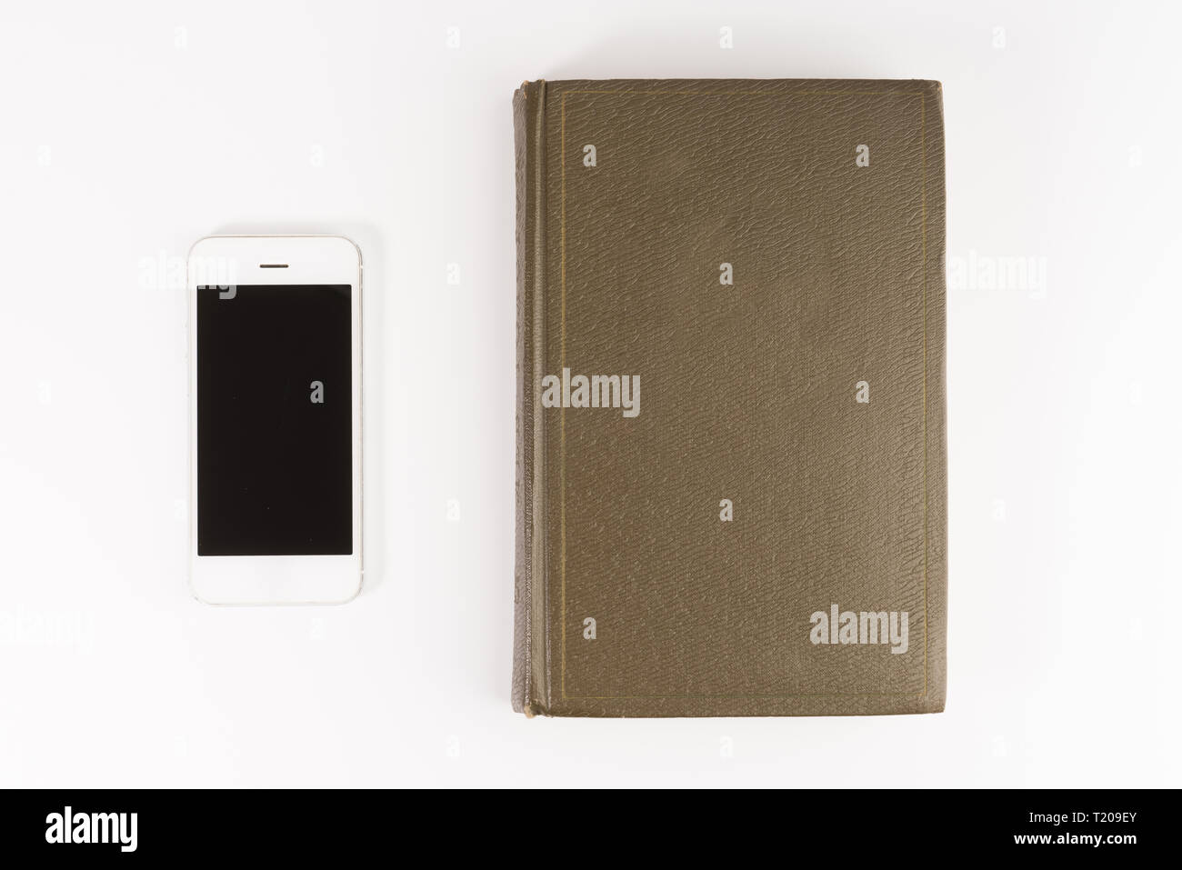 Smartphone versus old paper book, isolated on white background Stock ...