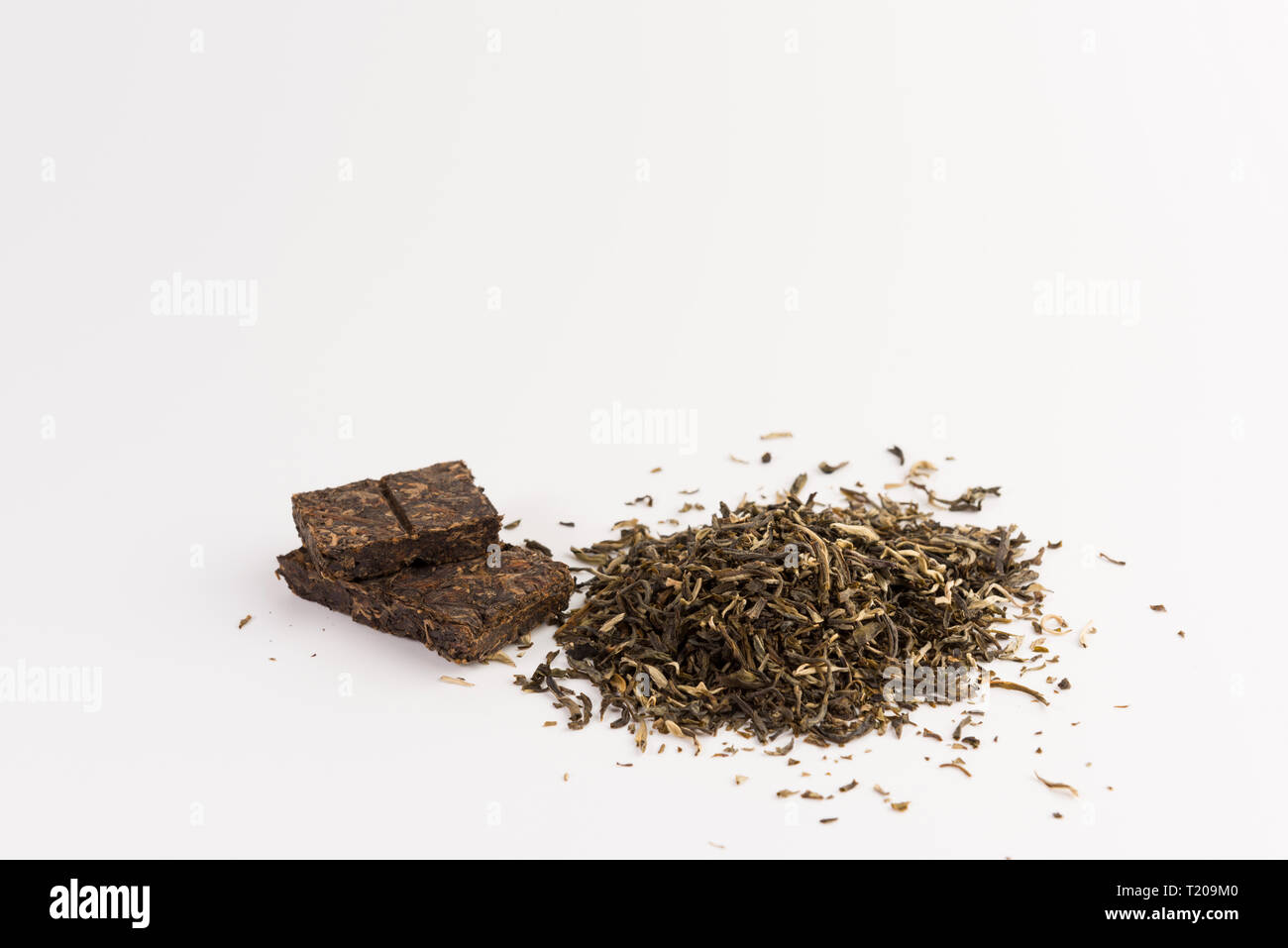 Pile of green tea isolated on white background Stock Photo - Alamy