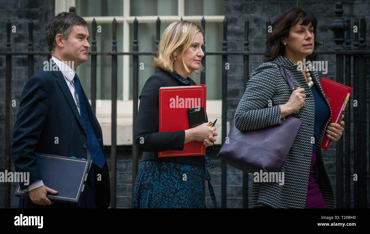 Ministers depart Downing Street following cabinet meeting. Featuring ...
