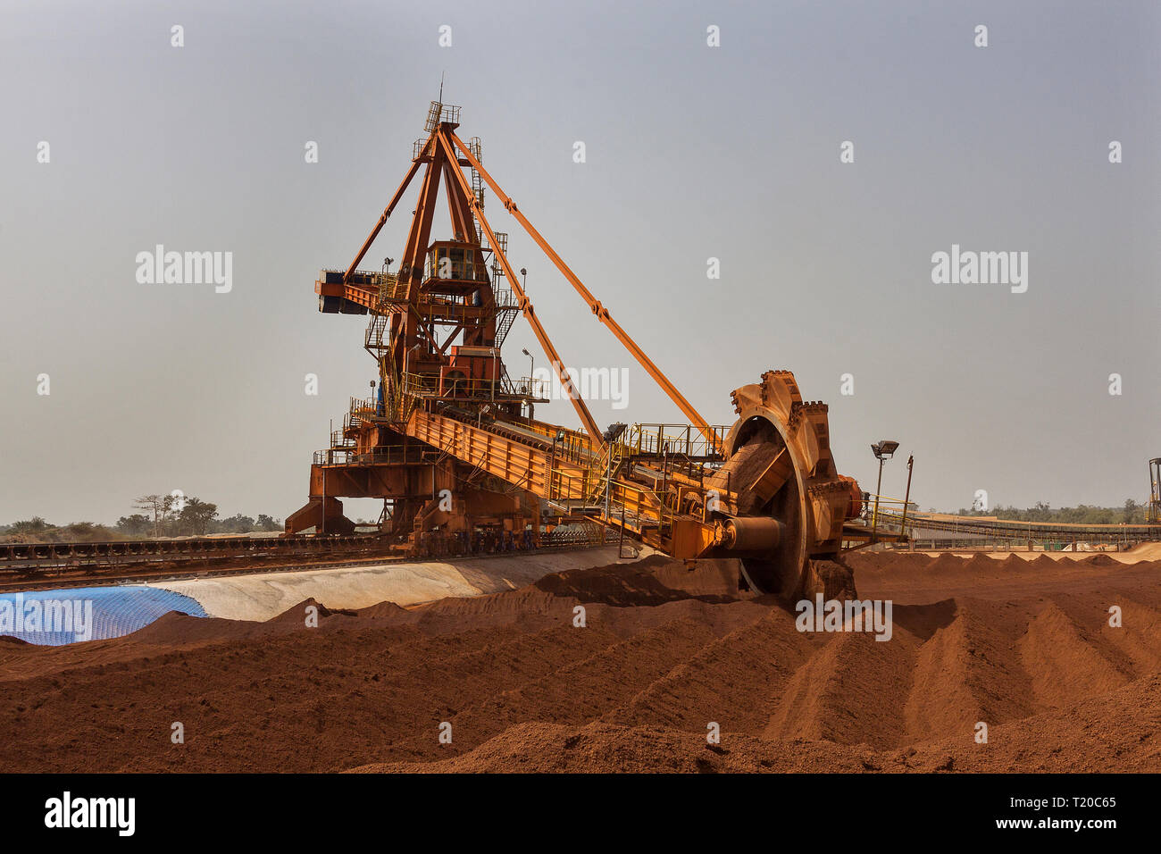 Port operations for managing and transporting iron ore. Bucket ...