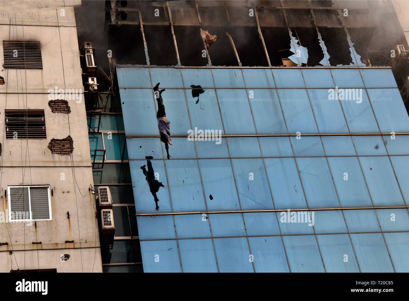 Dhaka, Bangladesh - March, 28, 2019: Several people trapped inside the ...