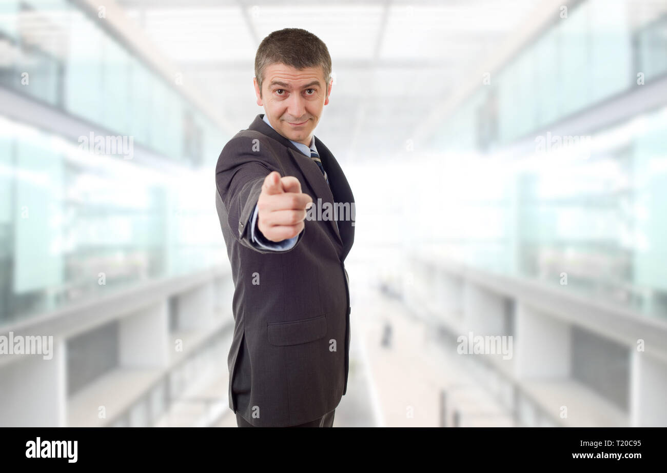 happy business man pointing, at the office Stock Photo - Alamy