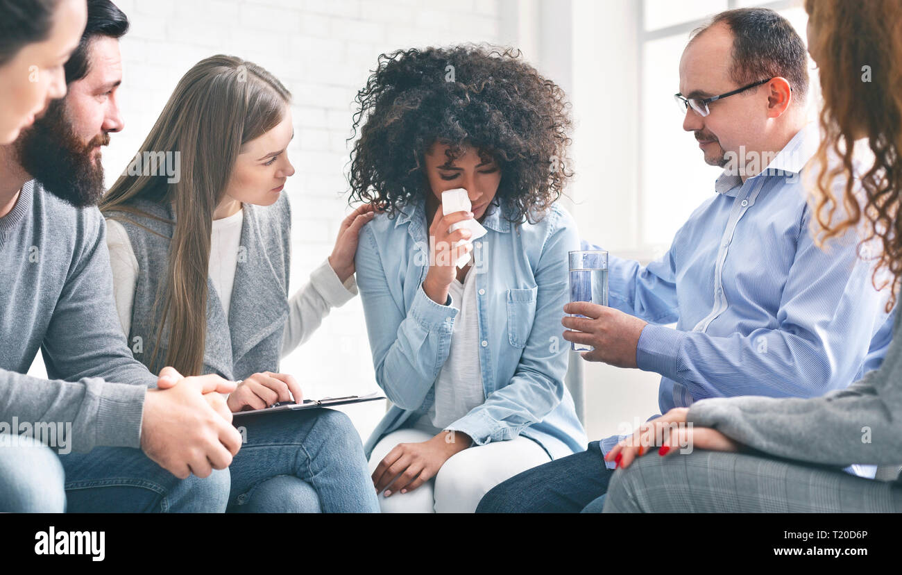 Young woman with emotional problems crying during psychotherapy Stock ...