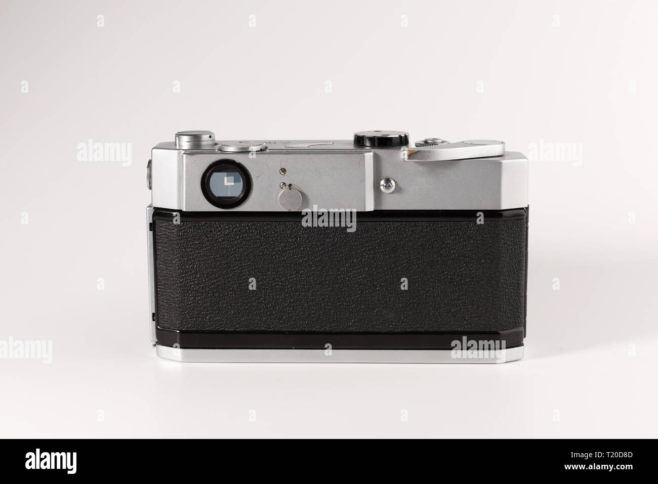 Old photo camera isolated on white background, back view Stock Photo ...