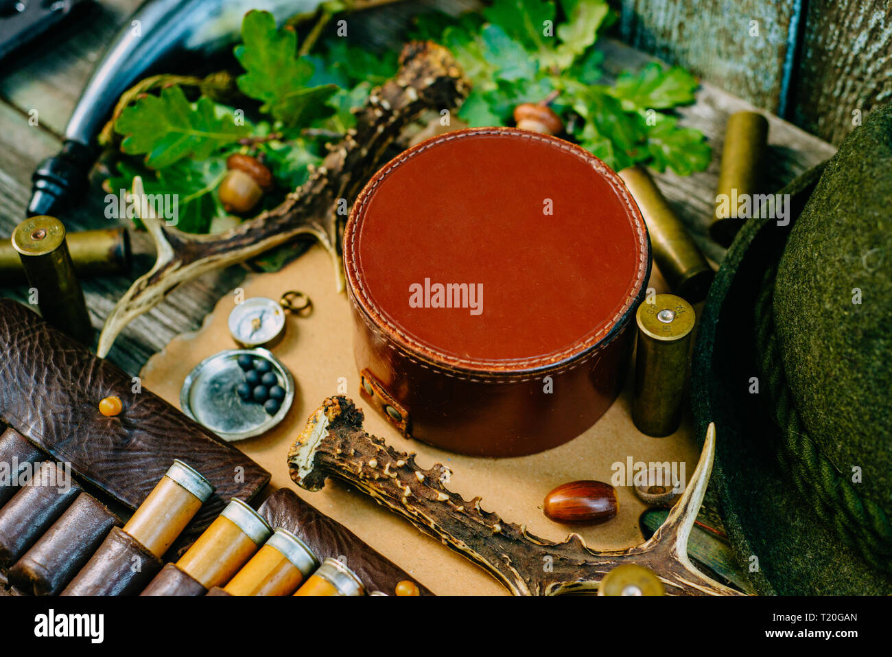 Closeup round leather hunt box for information among hunting or tourist ...