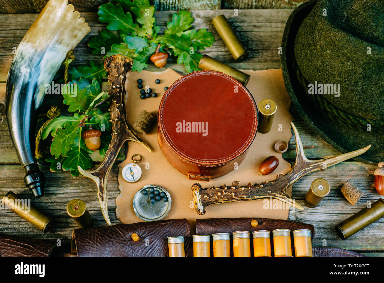 Closeup round leather hunt box for information among hunting or tourist ...