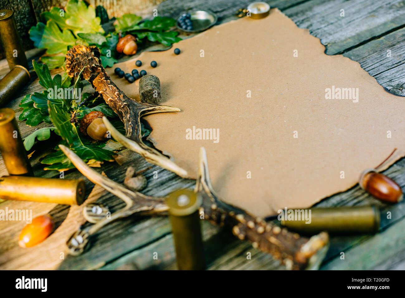 Closeup vintage sheet of paper with hunting equipment from left side on ...