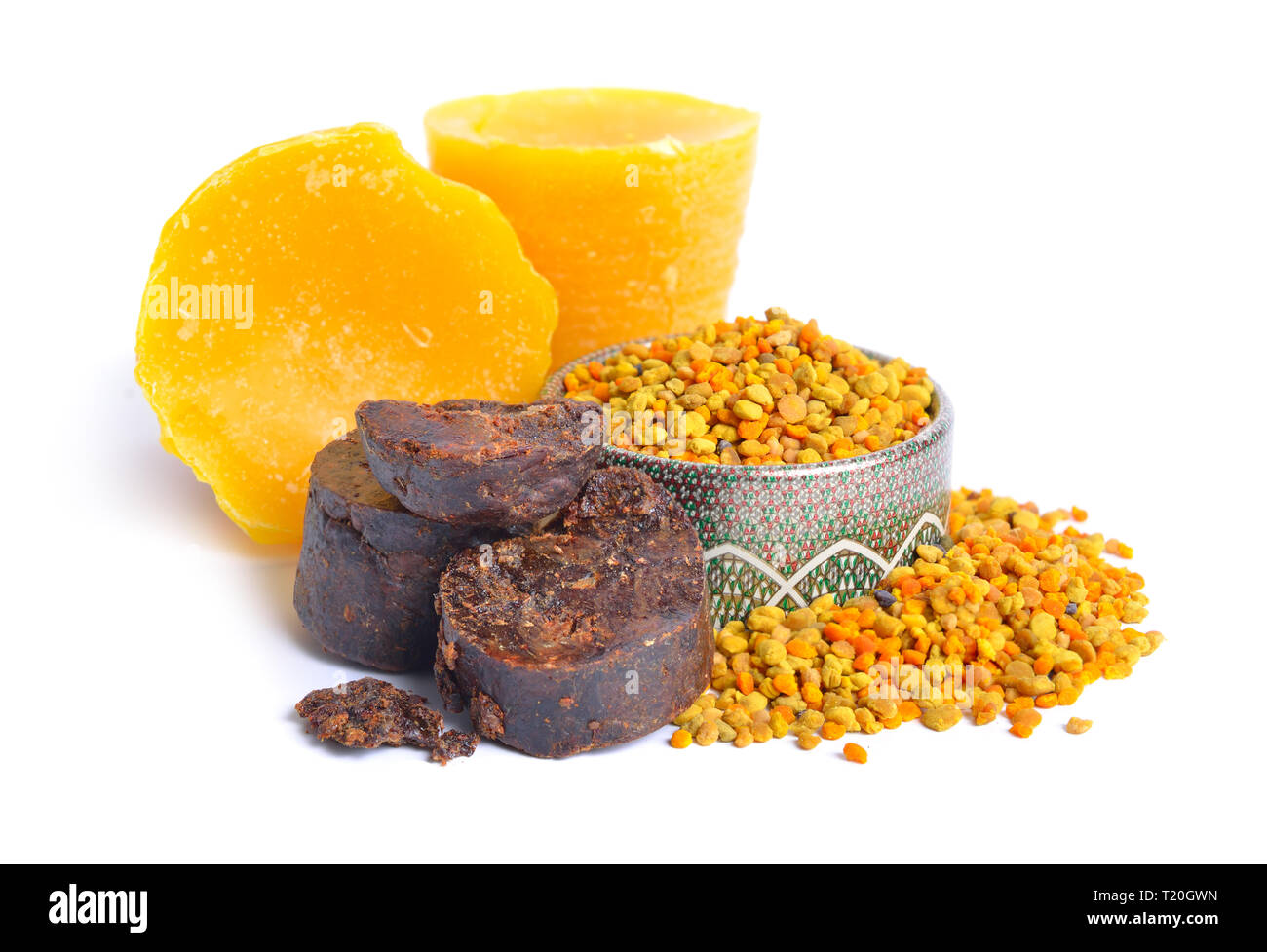 Bee pollen baskets with Propolis or bee glue and with Beeswax. Isolated ...
