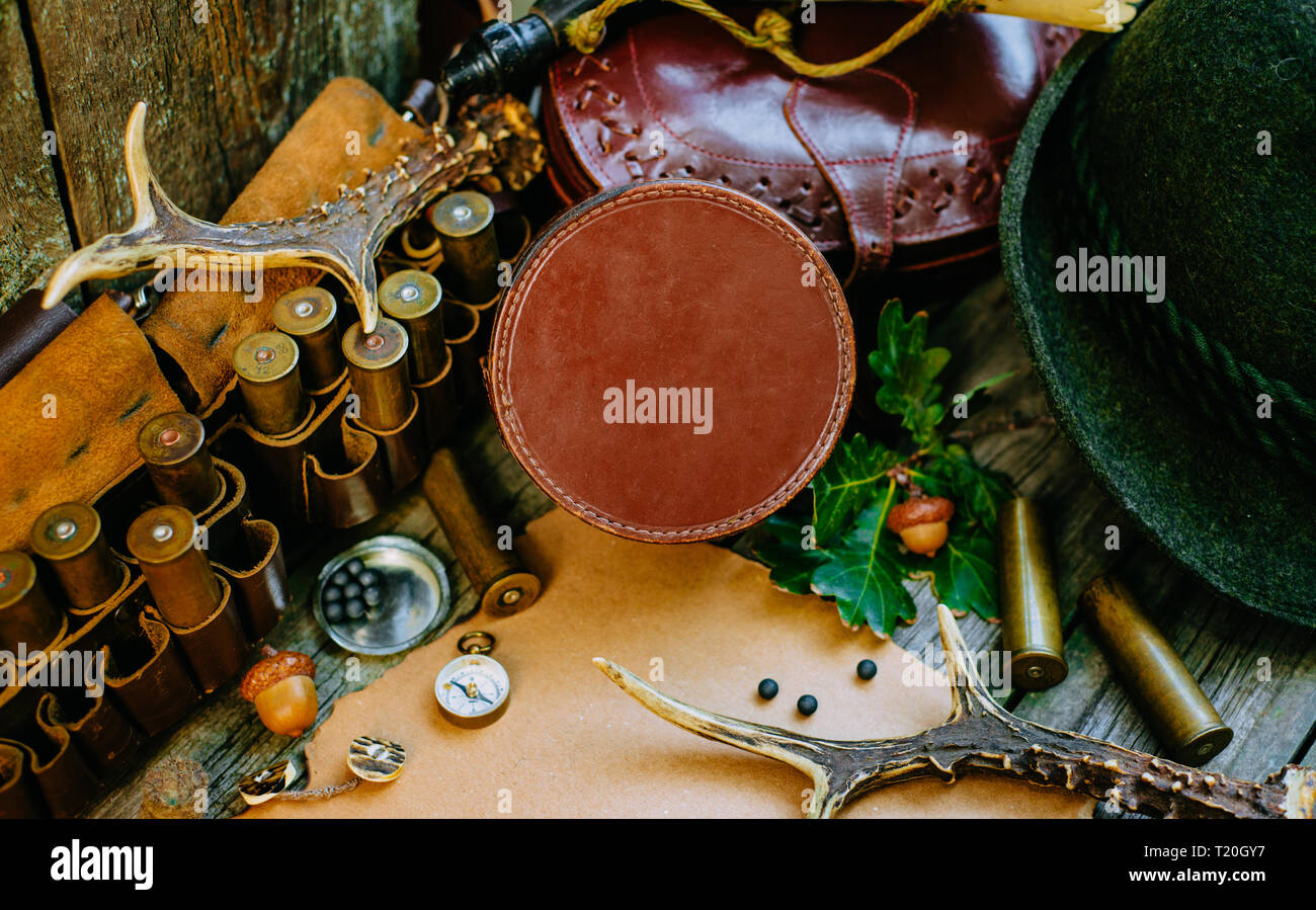 Closeup round hunt box for information among hunting or tourist vintage ...