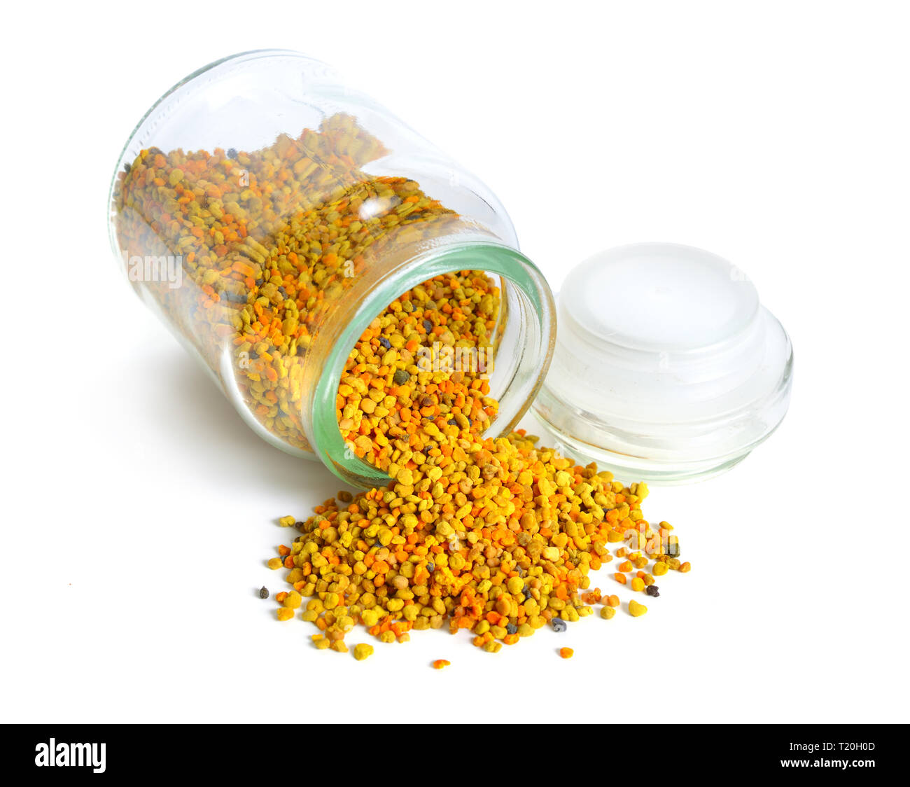 Bee pollen baskets in the glass jar. isolated on white background Stock ...
