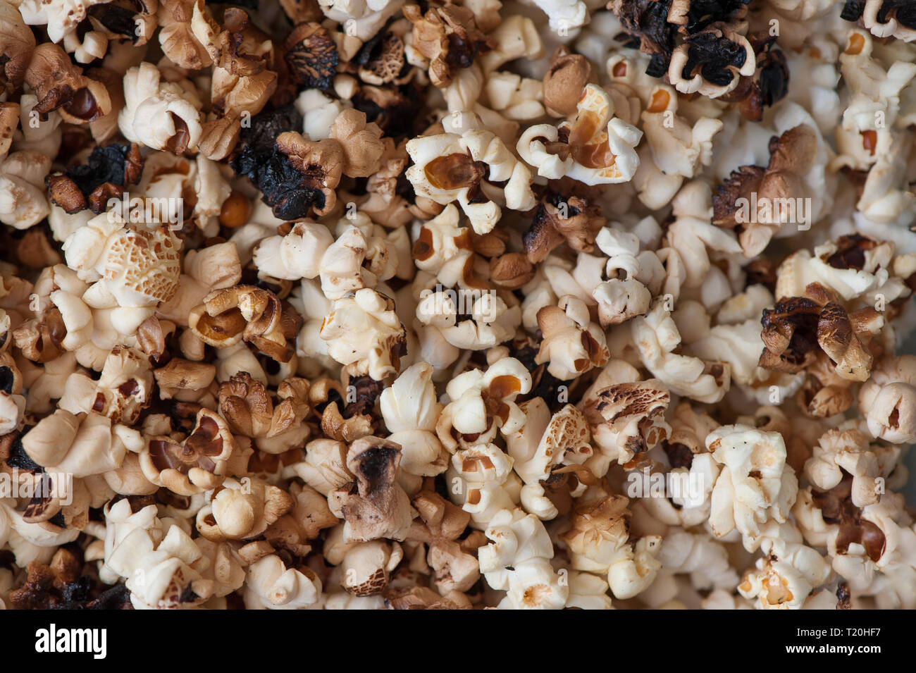 Texture of burnt popcorn background Stock Photo - Alamy