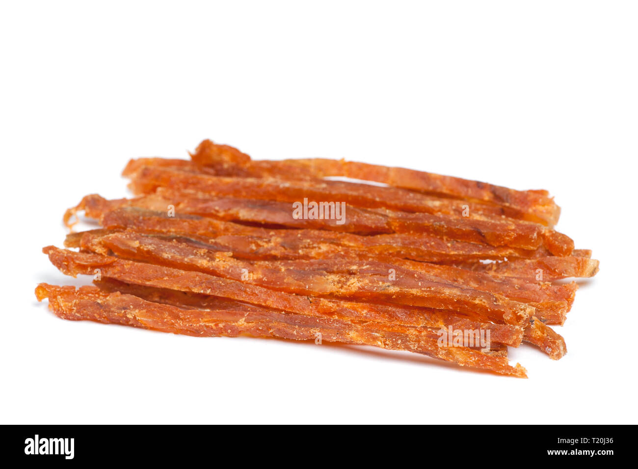 Dried salted fish sticks isolated on white Stock Photo - Alamy