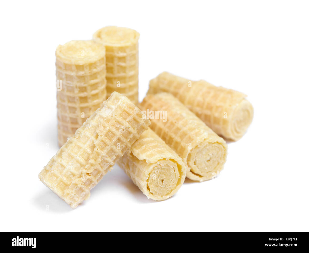 Group of wafer rolls isolated on white Stock Photo - Alamy