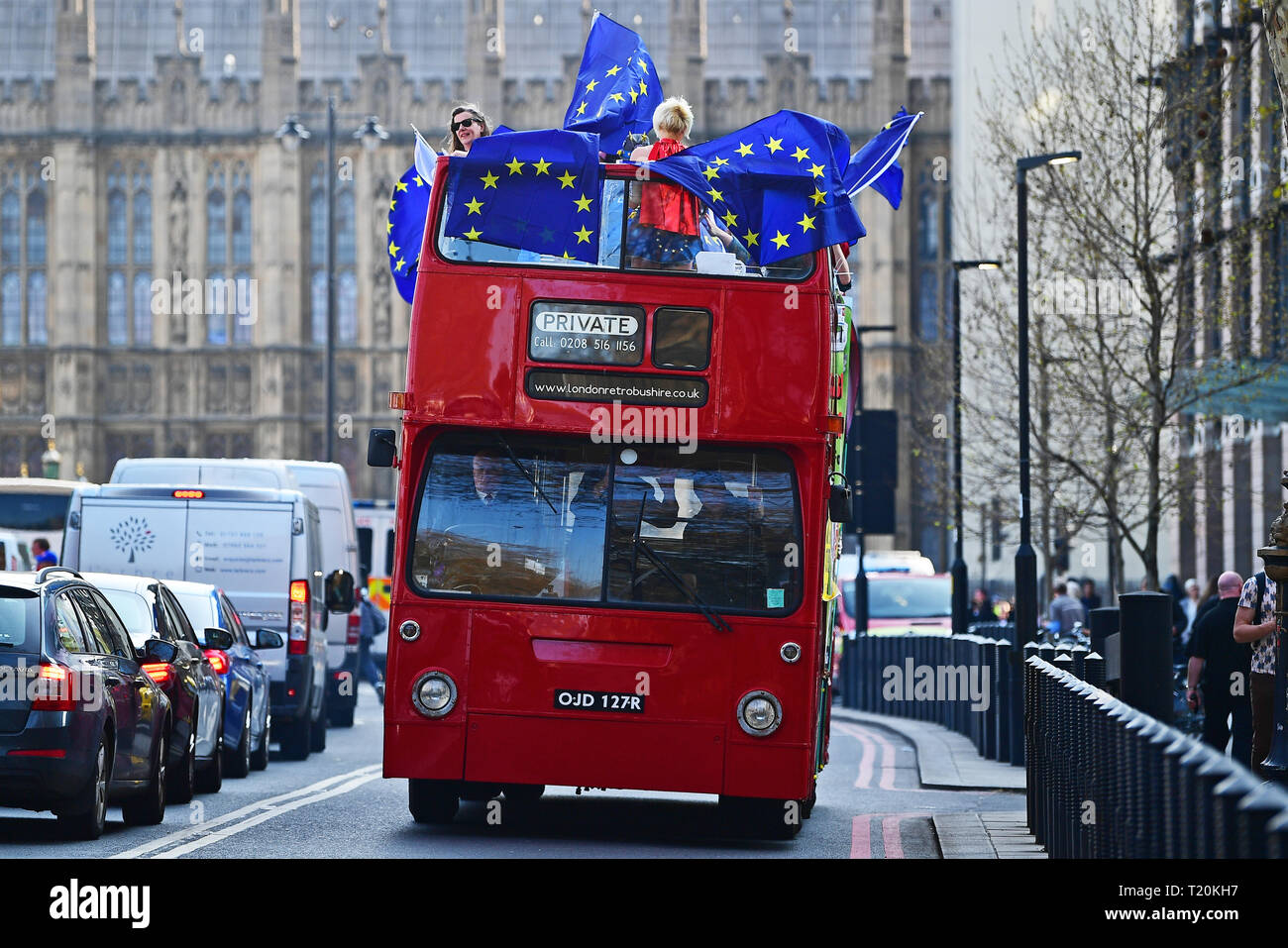 Remain supporters on board an open top bus outside the Houses of ...